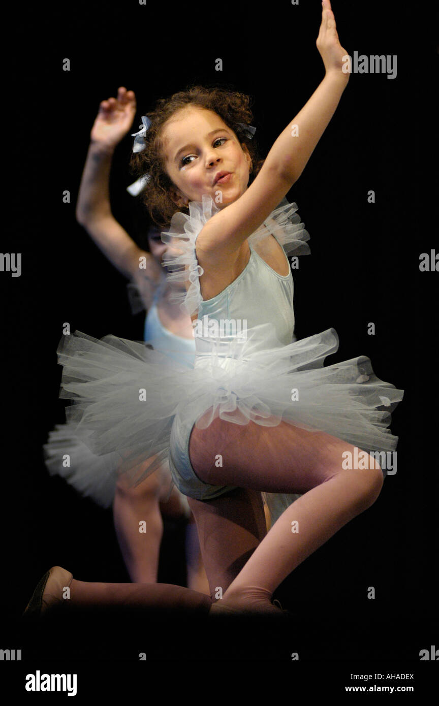 Ballerina girl performing on stage Stock Photo - Alamy