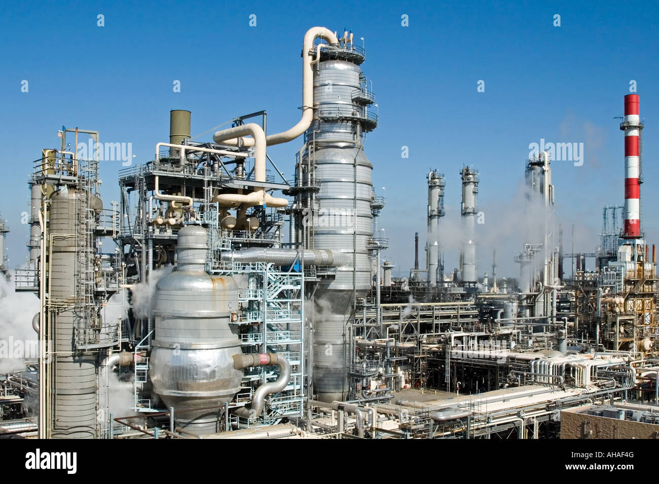 The industrial scale of an oil refinery and its systems Stock Photo - Alamy