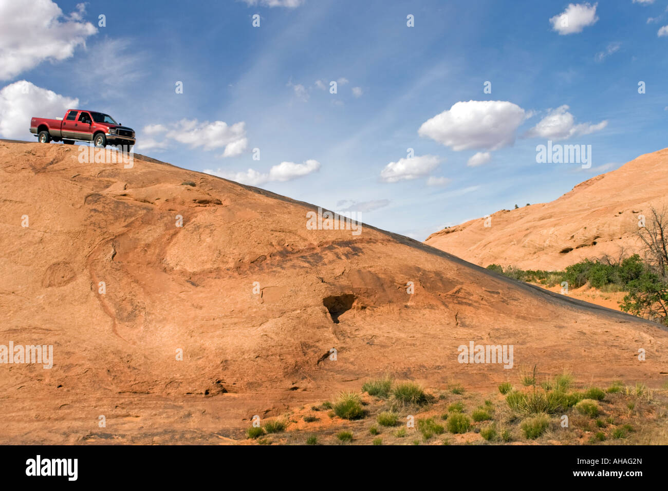 Ford F350 pickup truck driving on rock moab Utah Stock Photo - Alamy