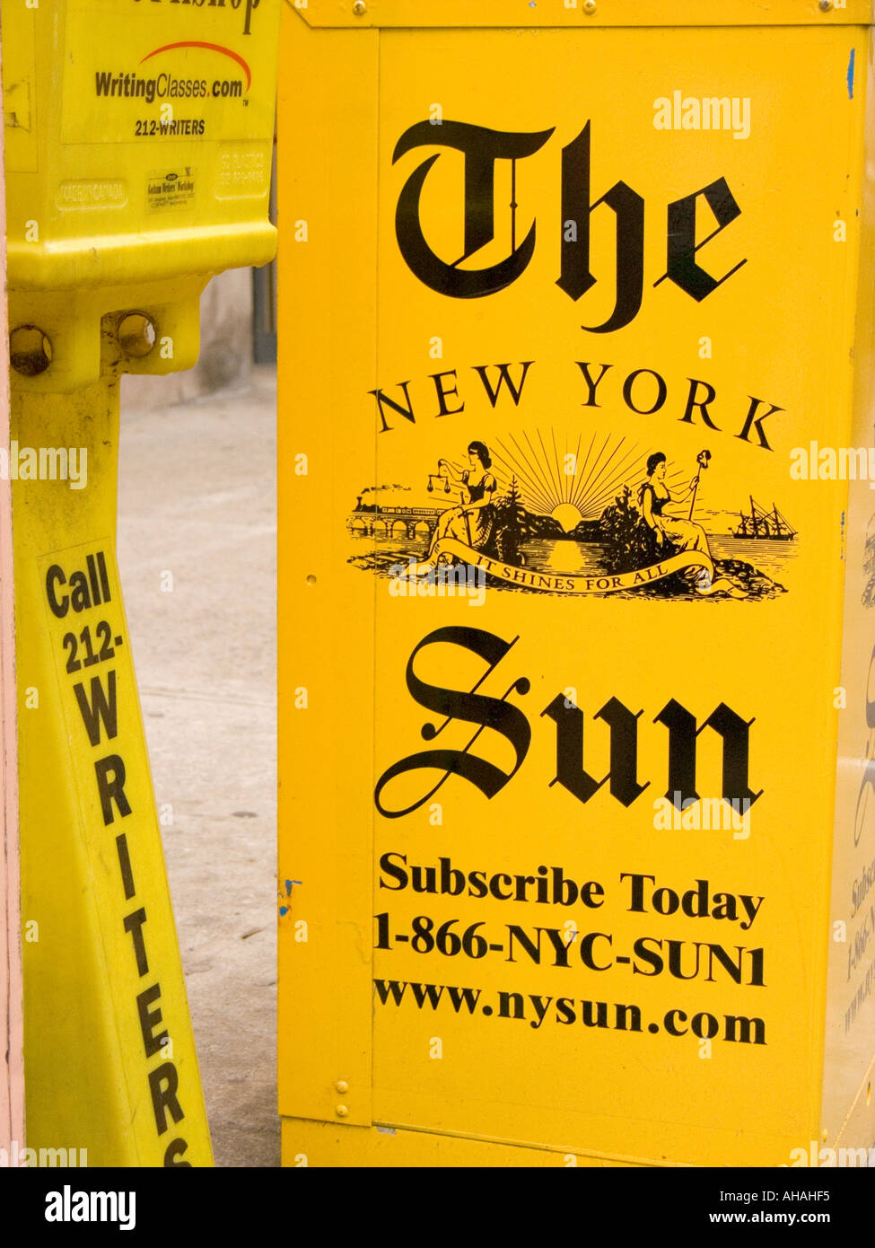 New York Sun newspaper street dispenser USA Stock Photo - Alamy
