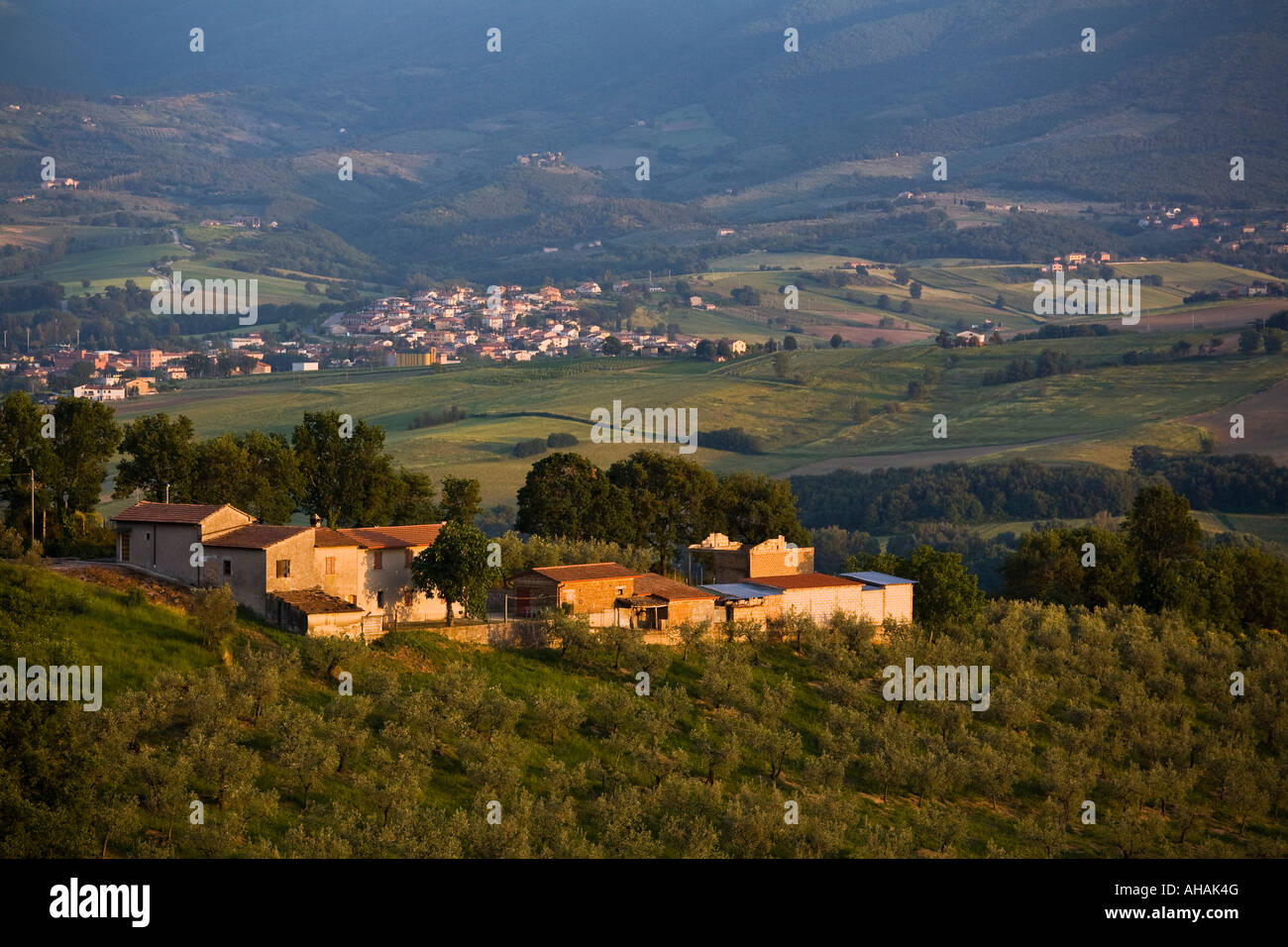Valley with farms and croplands and village of Bastardo Perugia Umbria ...