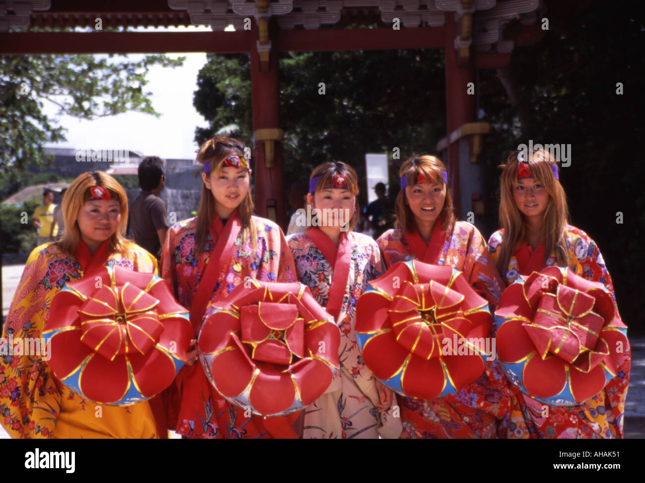 Mainland Japanese girls wear traditional Okinawan costume at Shuri ...