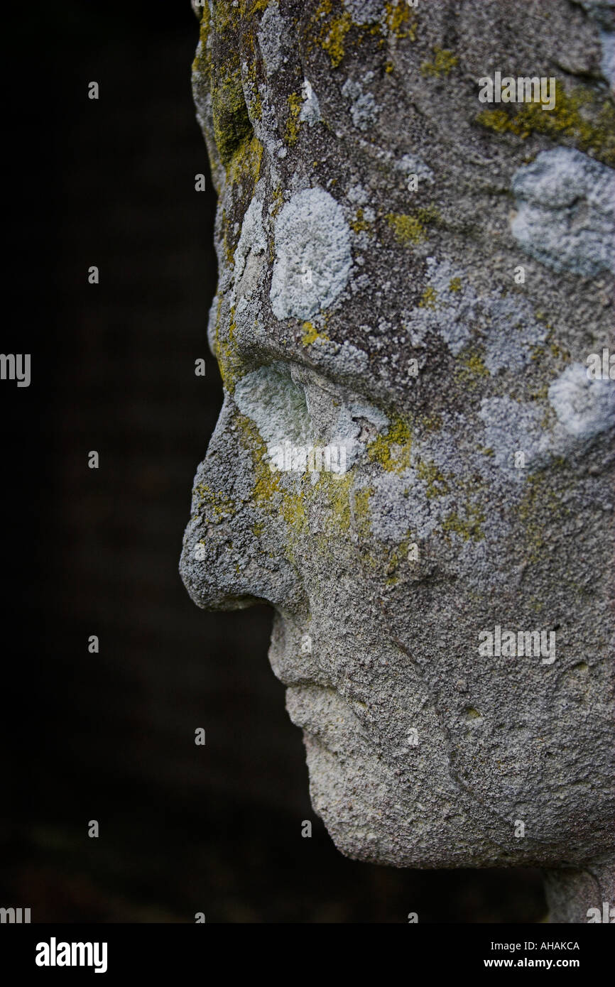 Side view of a garden statue face only Stock Photo - Alamy
