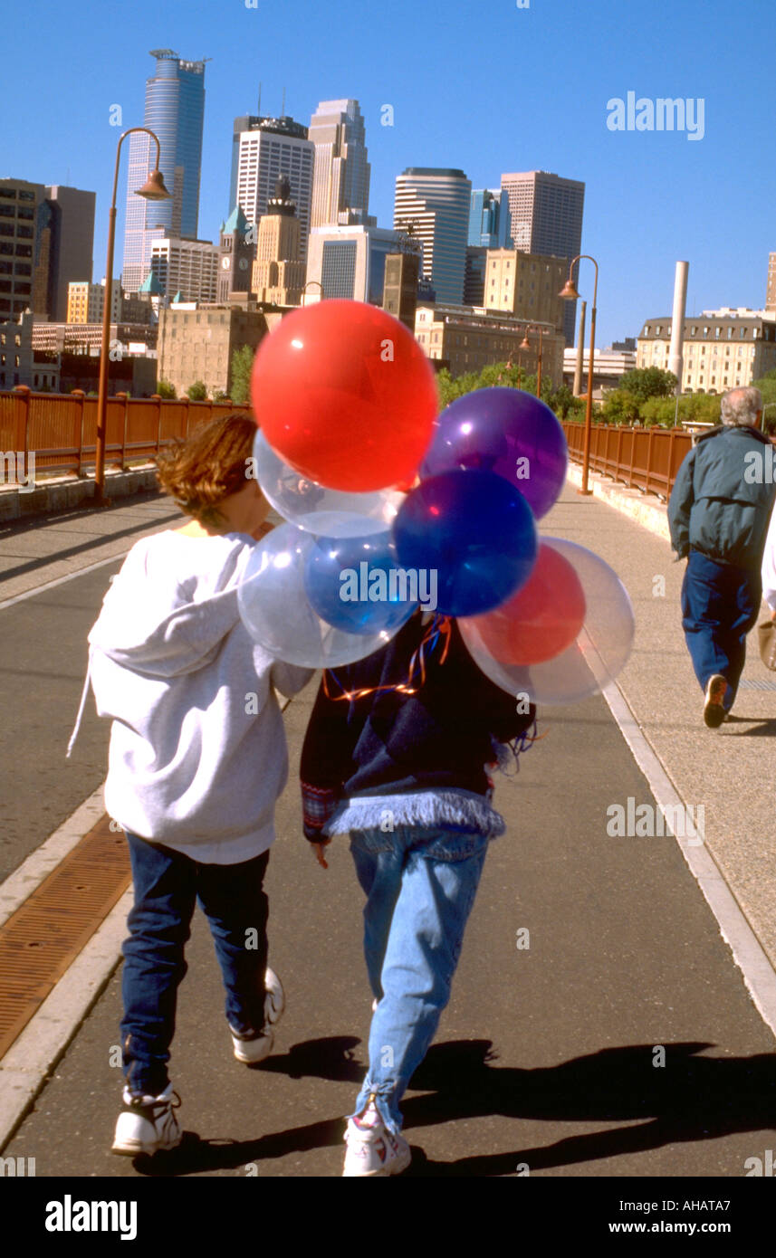 BHZ Friends age 10 walking across bridge with balloons at Exchange ...