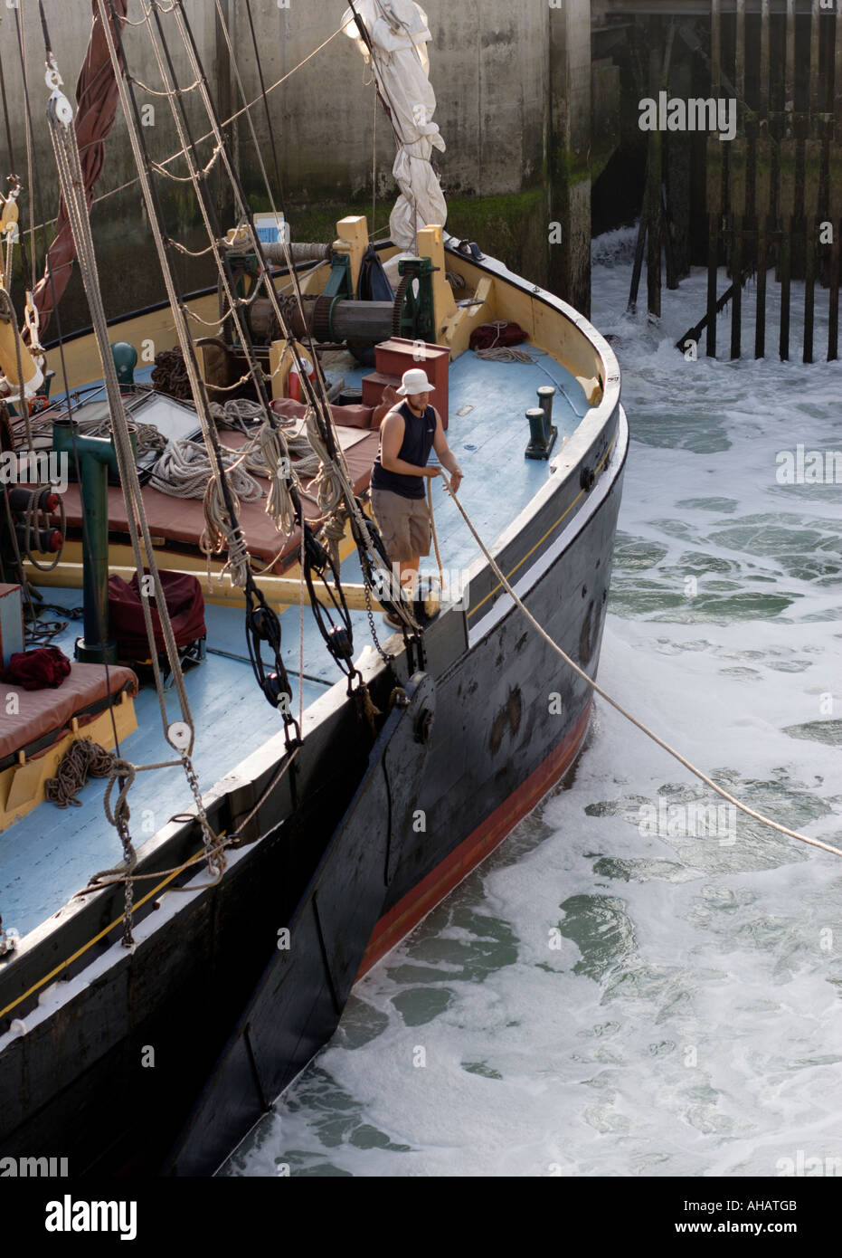 Detail of sailing barge passing through a lock Stock Photo - Alamy