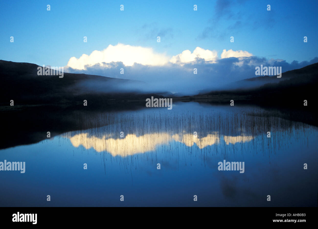 scottish loch with storm cloud Stock Photo - Alamy