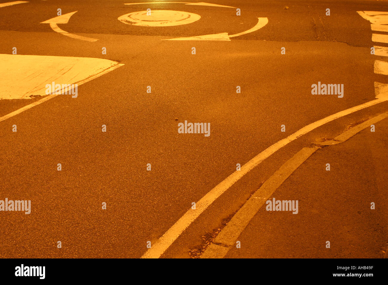 Mini roundabout at night in London Stock Photo - Alamy