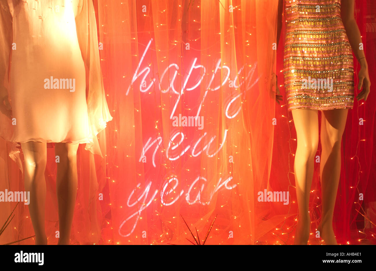 store window with happy new year character in neon light Stock Photo ...