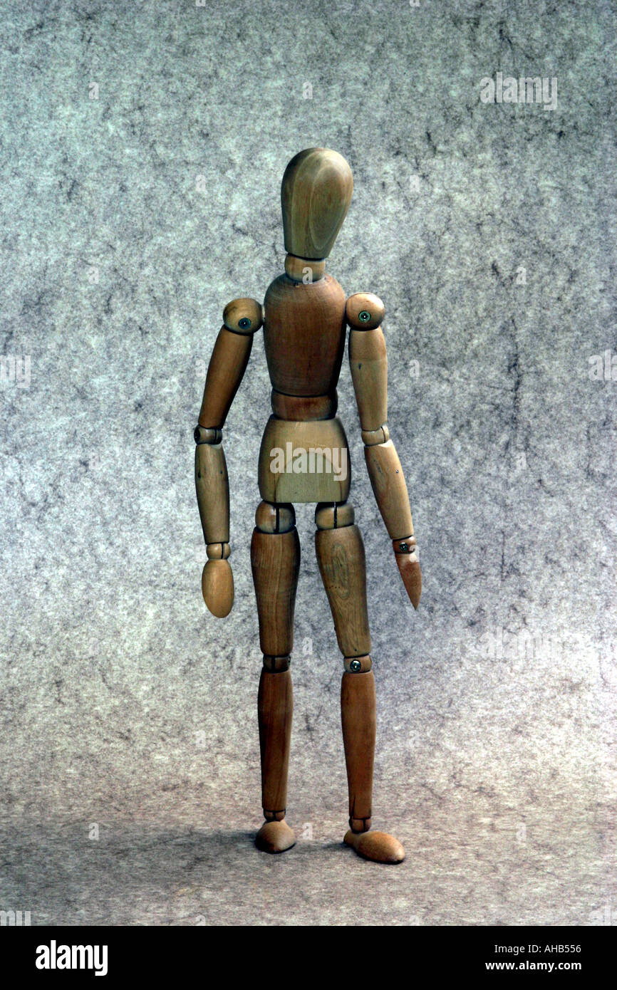 Artists wooden model figure walking towards the viewer Stock Photo - Alamy