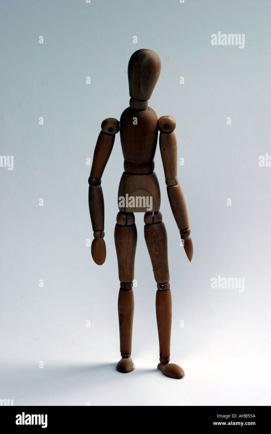 Artists wooden model figure walking towards the viewer Stock Photo - Alamy