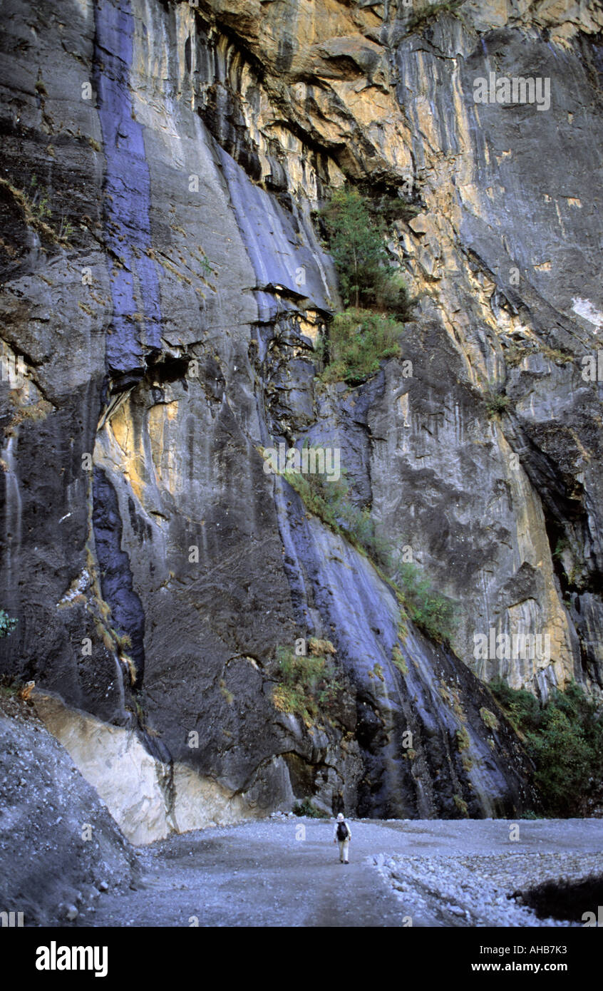 Scenic of path along magnificent cliffs in Dharapani surroundings ...