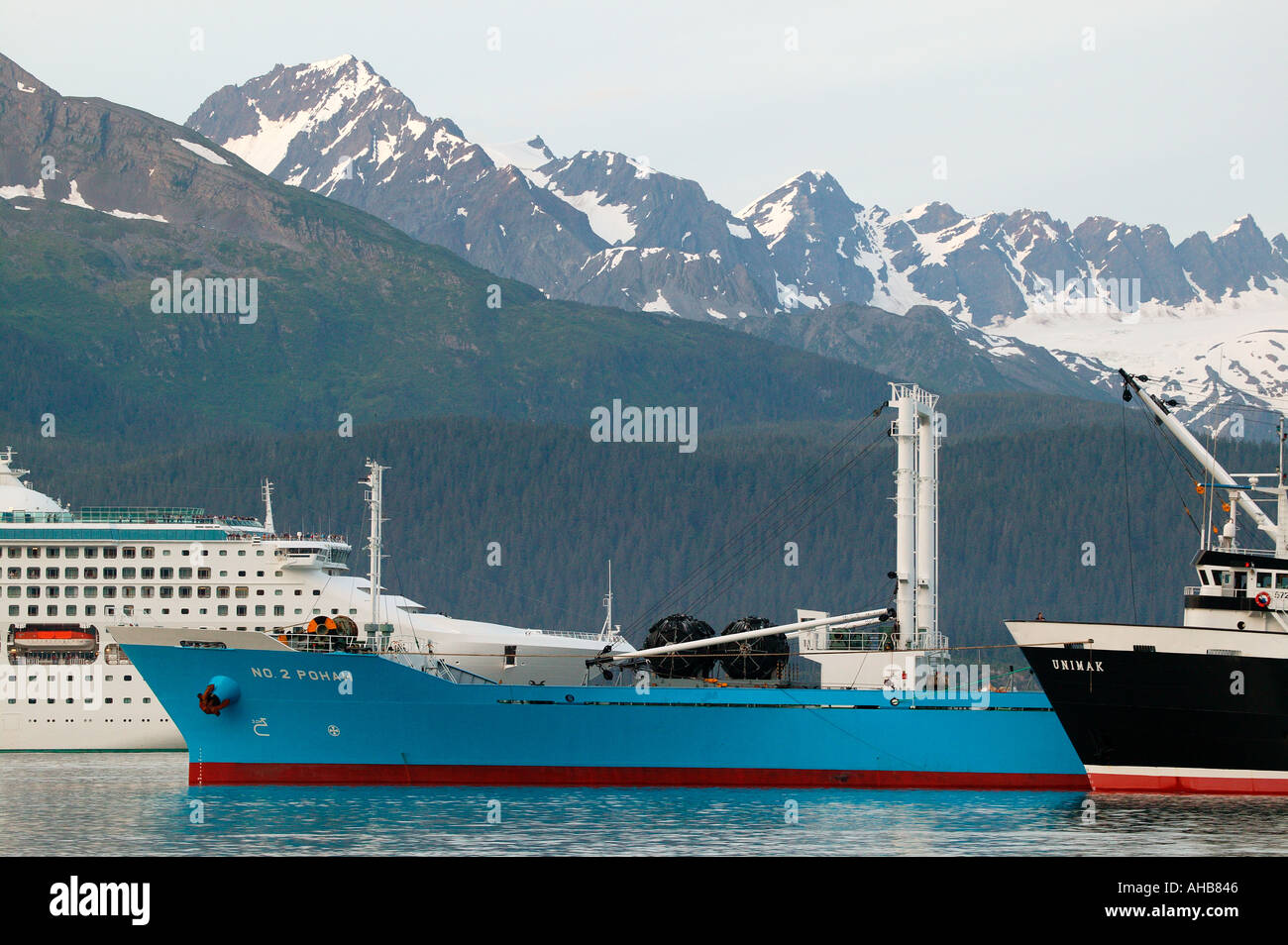 The cruiseship Dawn Princess passes by the fishing vessel Unimak as it ...