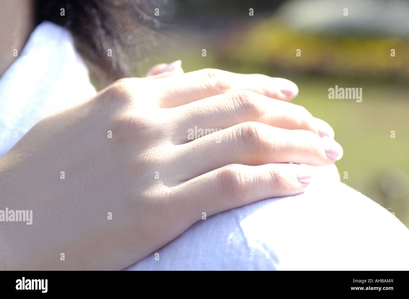 Couple who turns a hand to the shoulder Stock Photo - Alamy