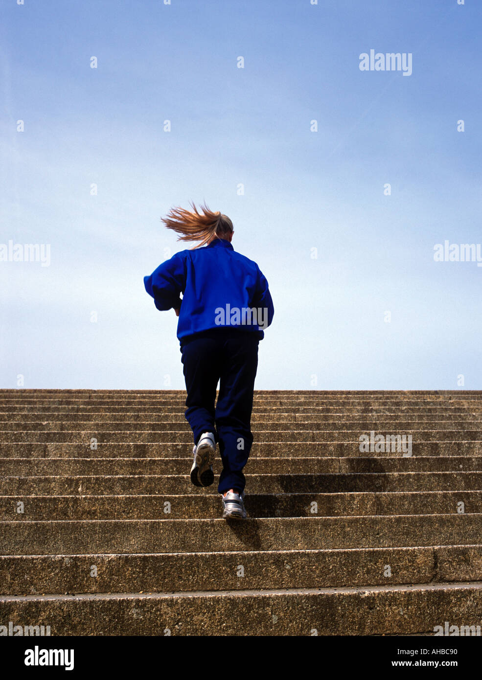 girl running up steps Stock Photo - Alamy