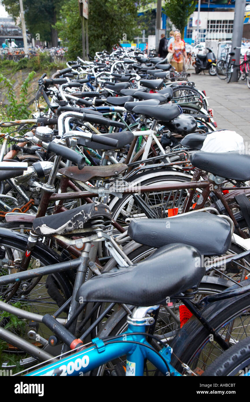 Lots of bikes parked at side of street, central Amsterdam Stock Photo ...