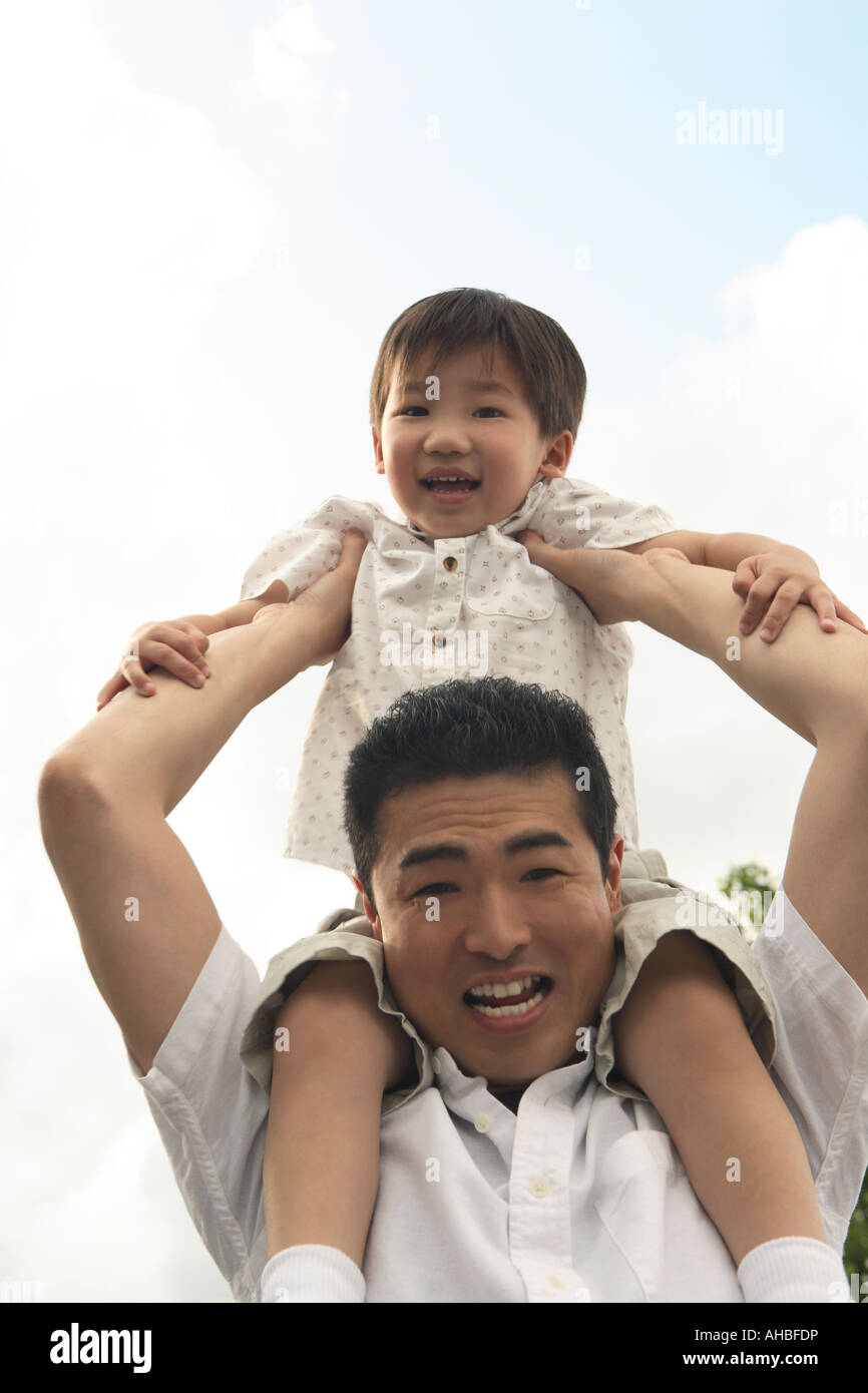 Pickaback of the father Stock Photo - Alamy