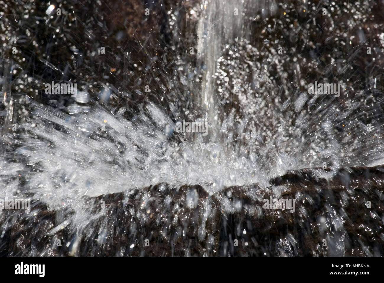 water splashing down the fountain stones Stock Photo - Alamy