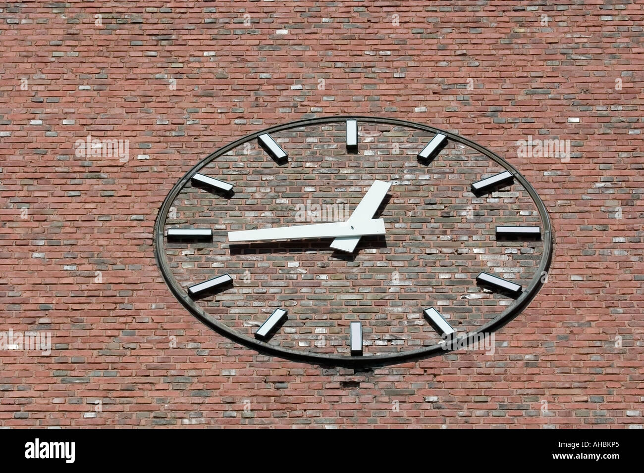 clock on red brick wall Stock Photo - Alamy