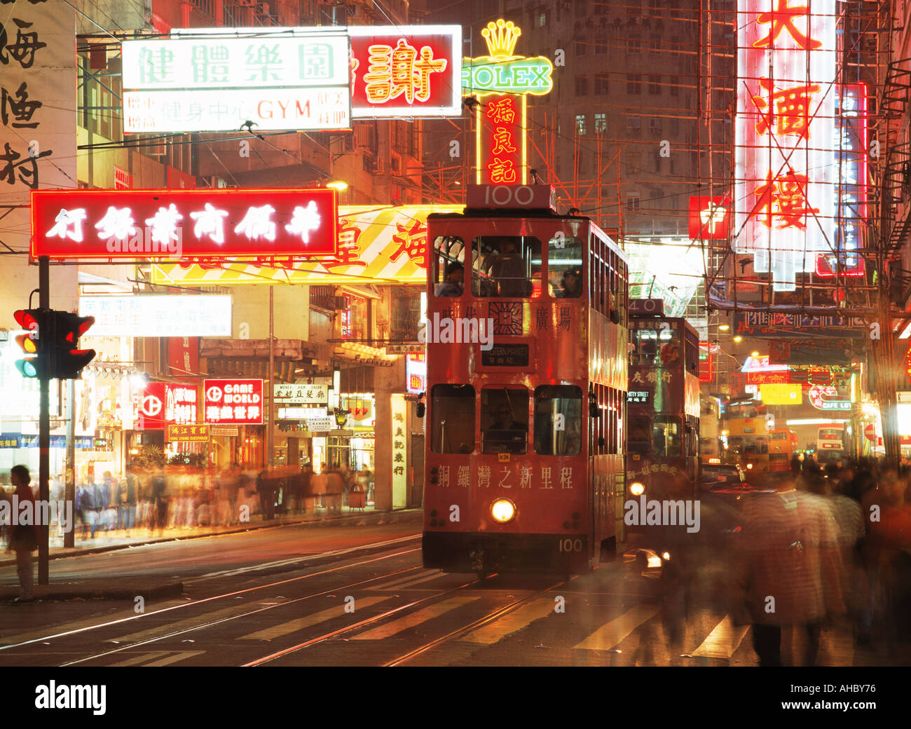 Trams and traffic at night on Hennessy Raod in Causeway Bay Hong Kong Stock Photo - Alamy