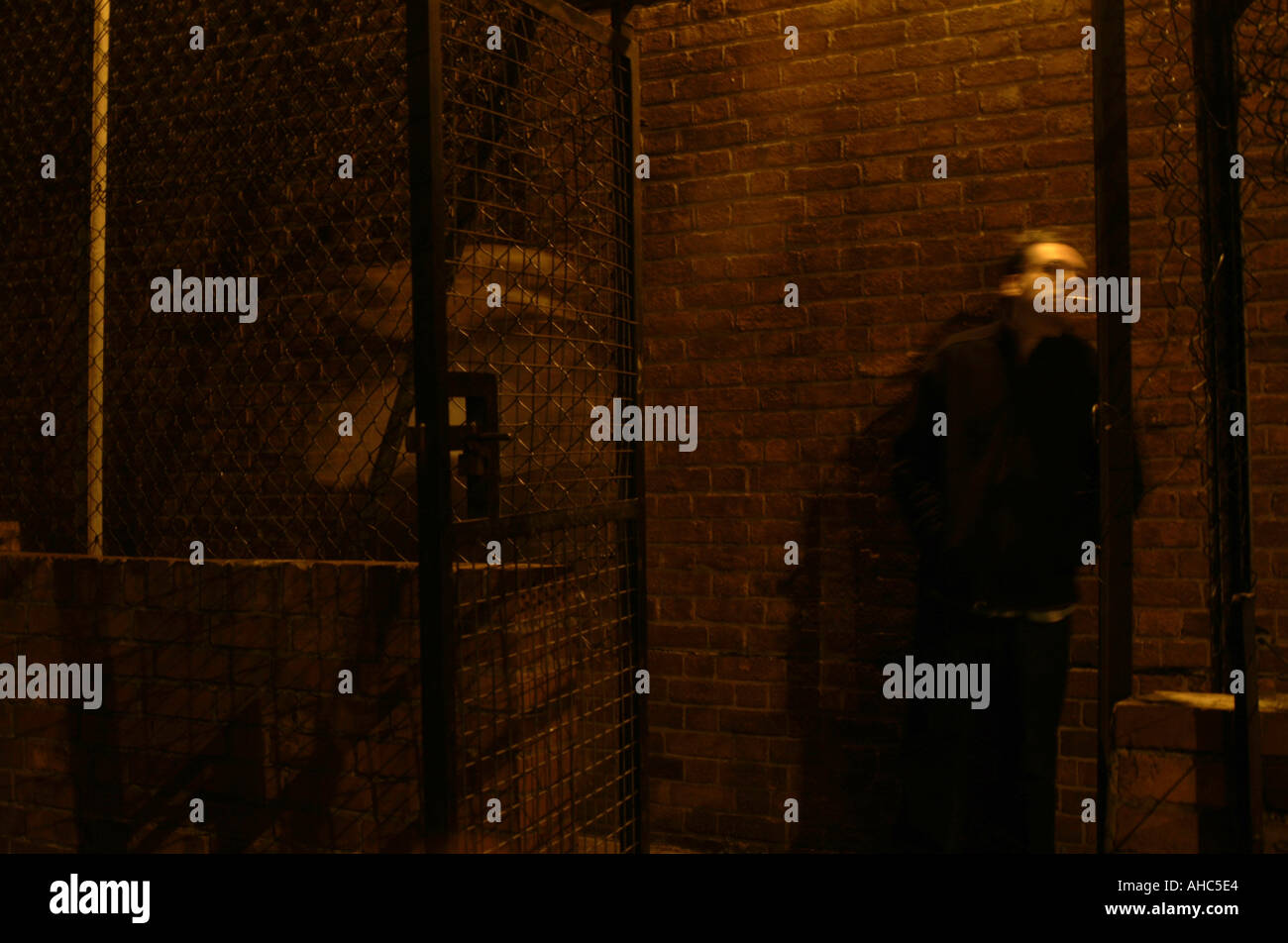 Drug Dealer in an alleyway Stock Photo - Alamy