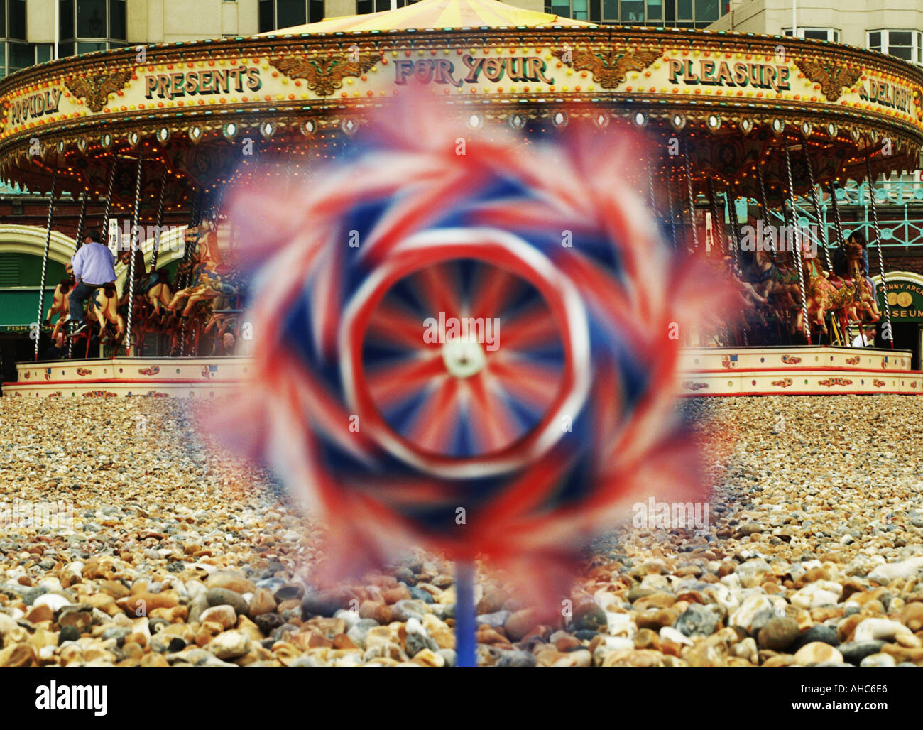 Union Jack Windmill and Carousel Brighton Beach England UK Stock Photo ...