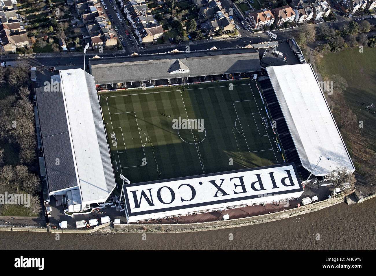 High level oblique aerial view east of Fulham Football Club in London ...