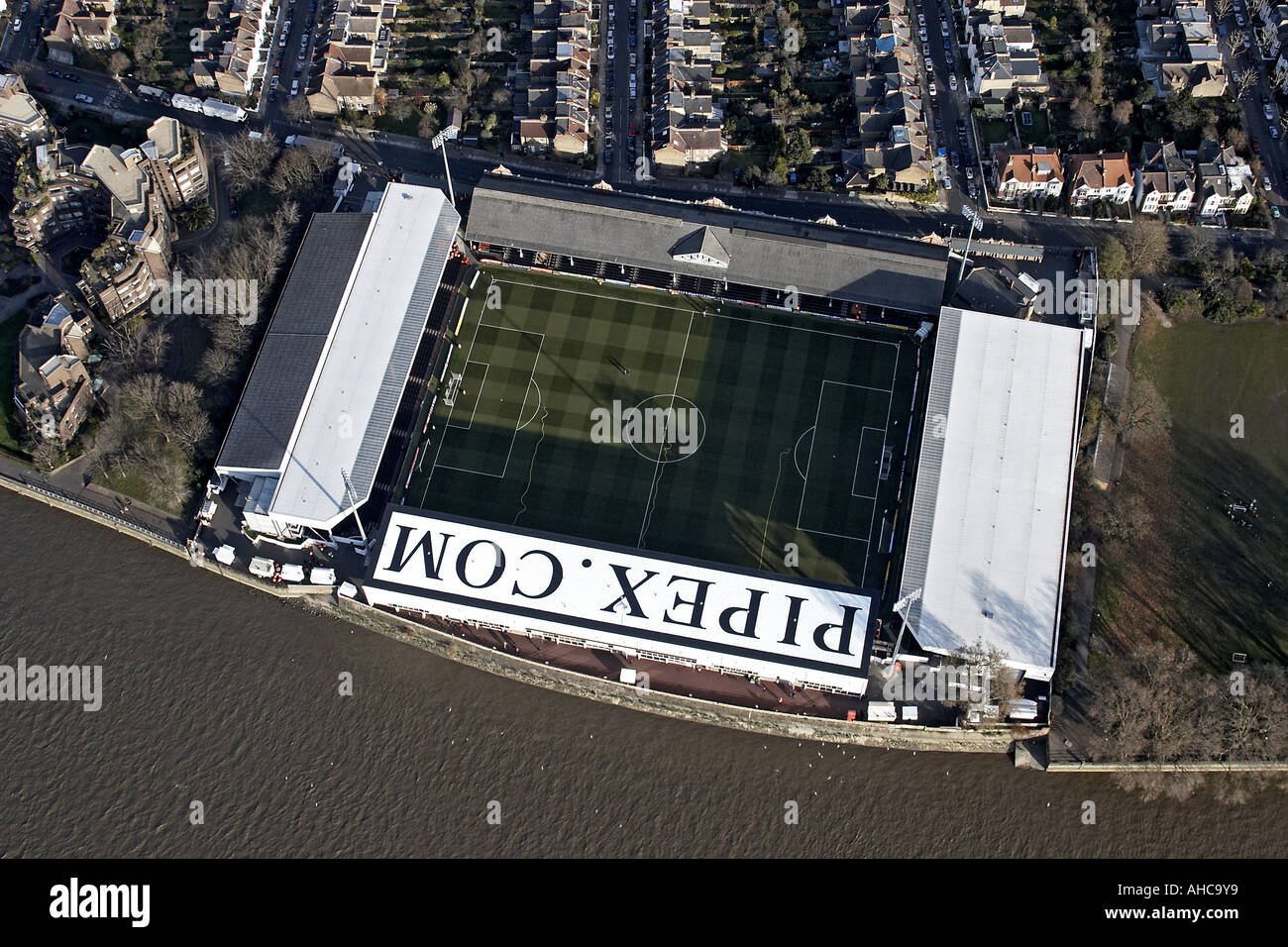 High level oblique aerial view north east of Fulham Football Club in ...