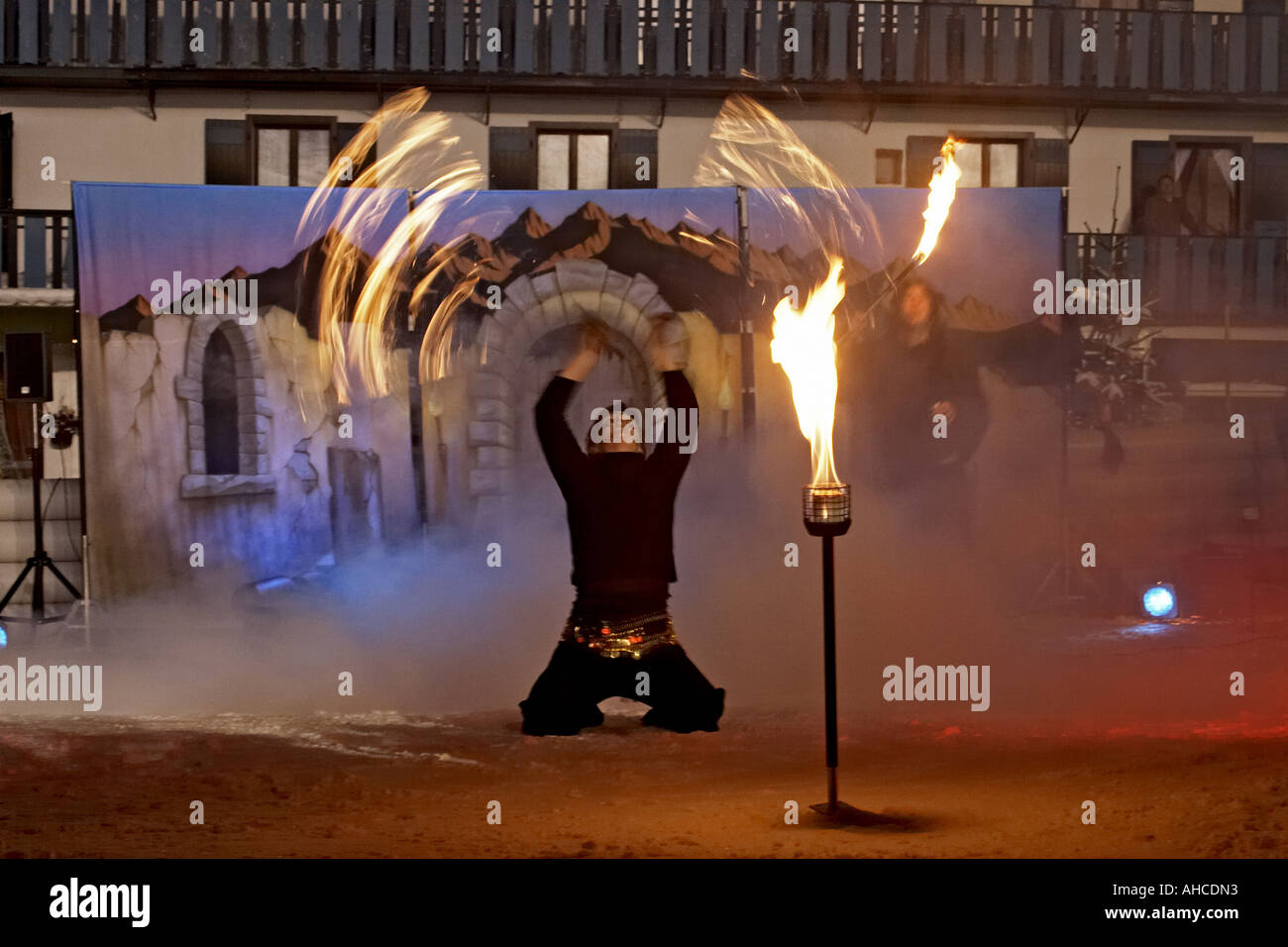 Fire dancers juggling Stock Photo - Alamy