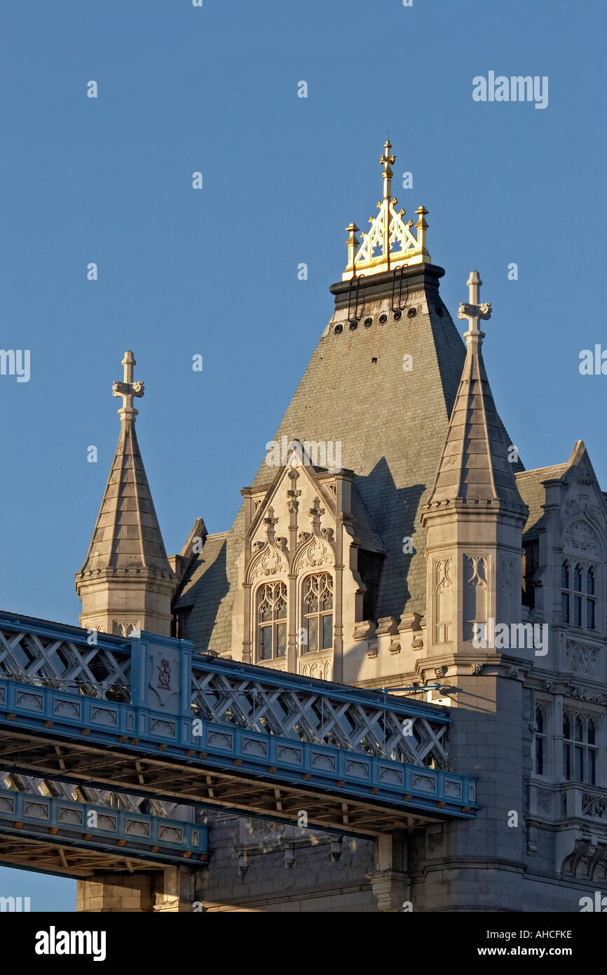 Tower Bridge main tower detail with golden peak apex in warm winter ...