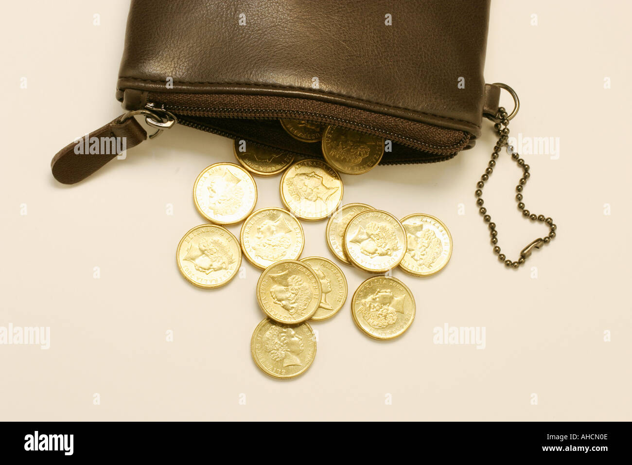 Purse and Coins Stock Photo - Alamy