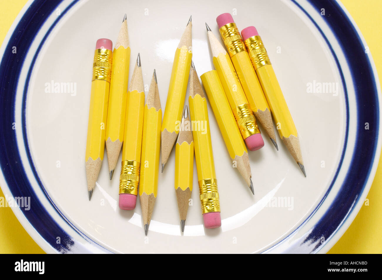 Short Pencils on Plate Stock Photo - Alamy