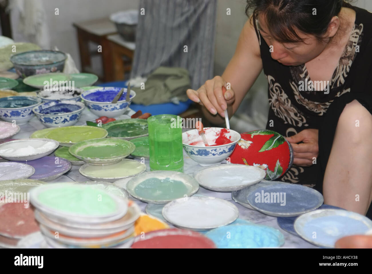 Lady creating a vase Stock Photo - Alamy