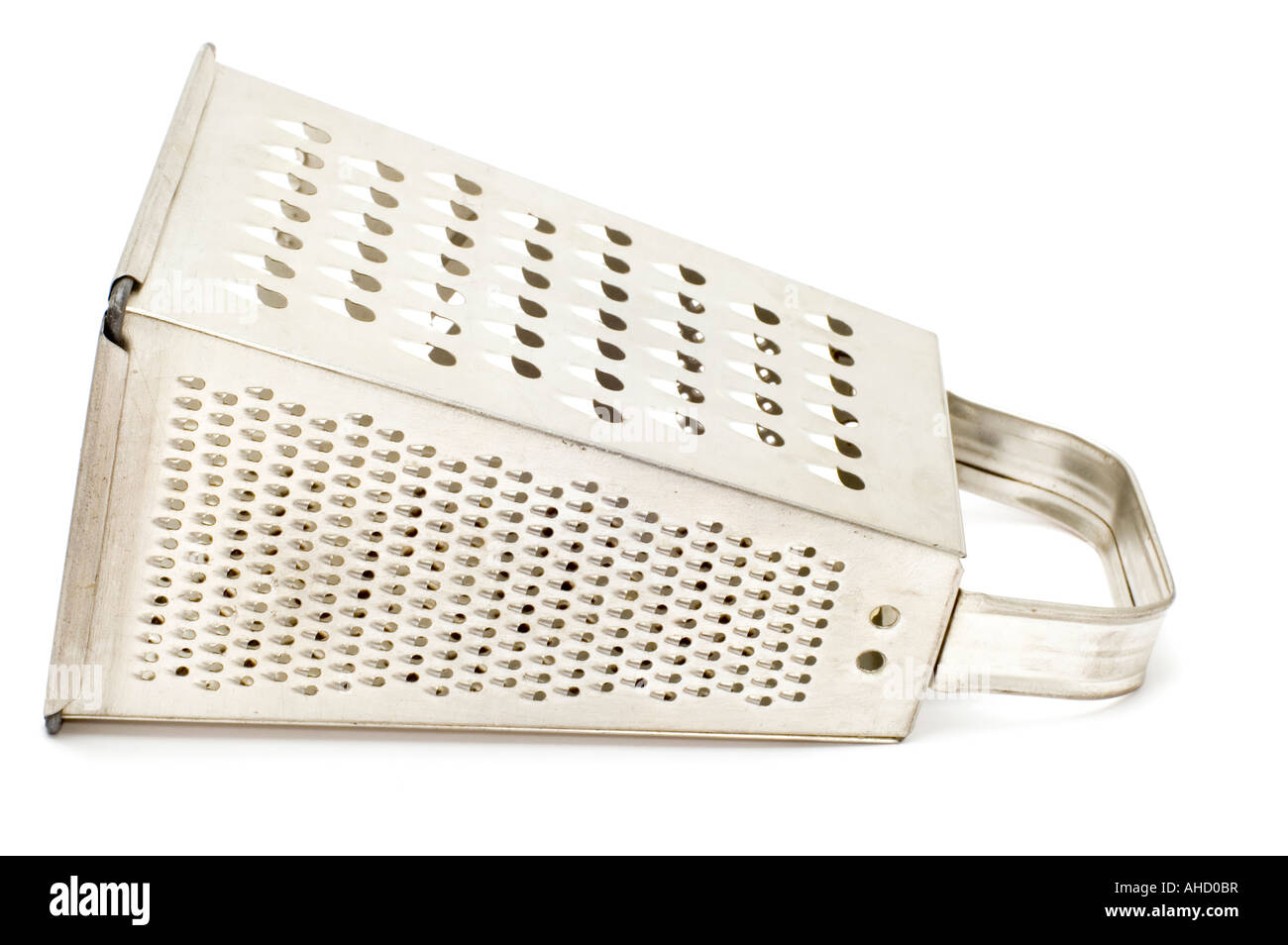 series object on white kitchen utensil Metal grater Stock Photo - Alamy