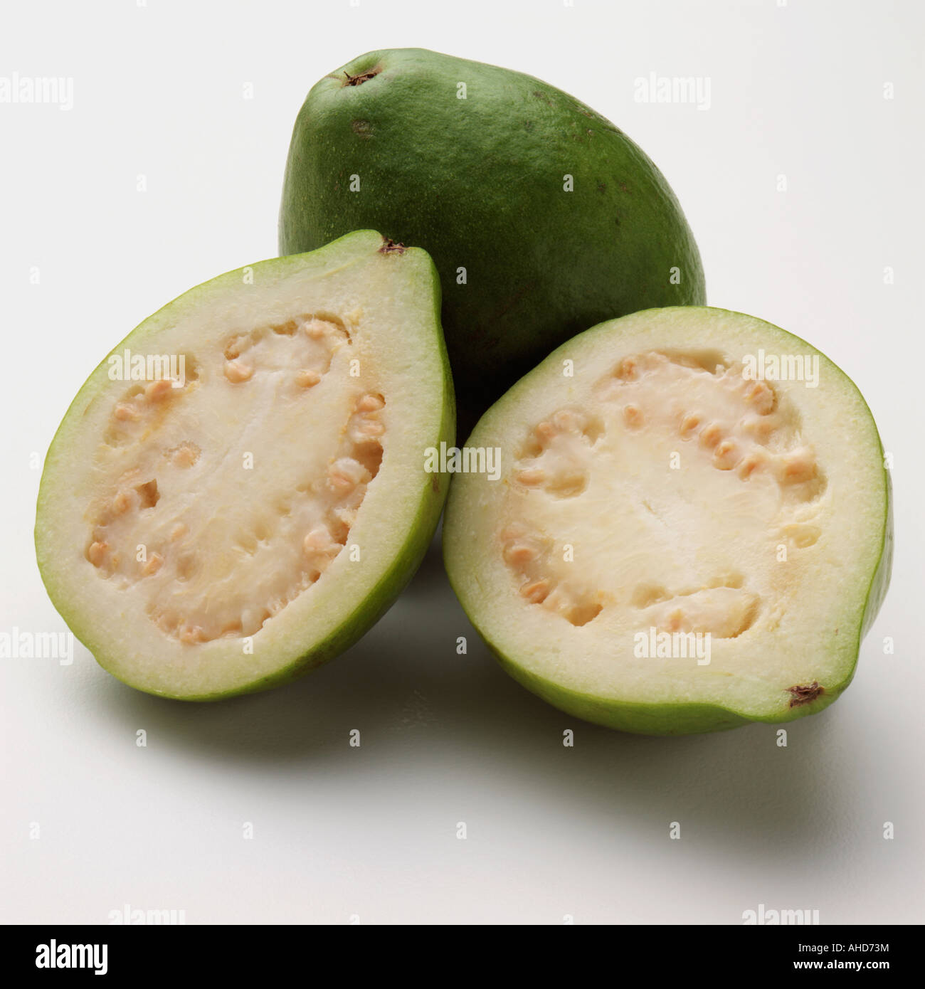Whole and half guava on a white background editorial food Stock Photo ...