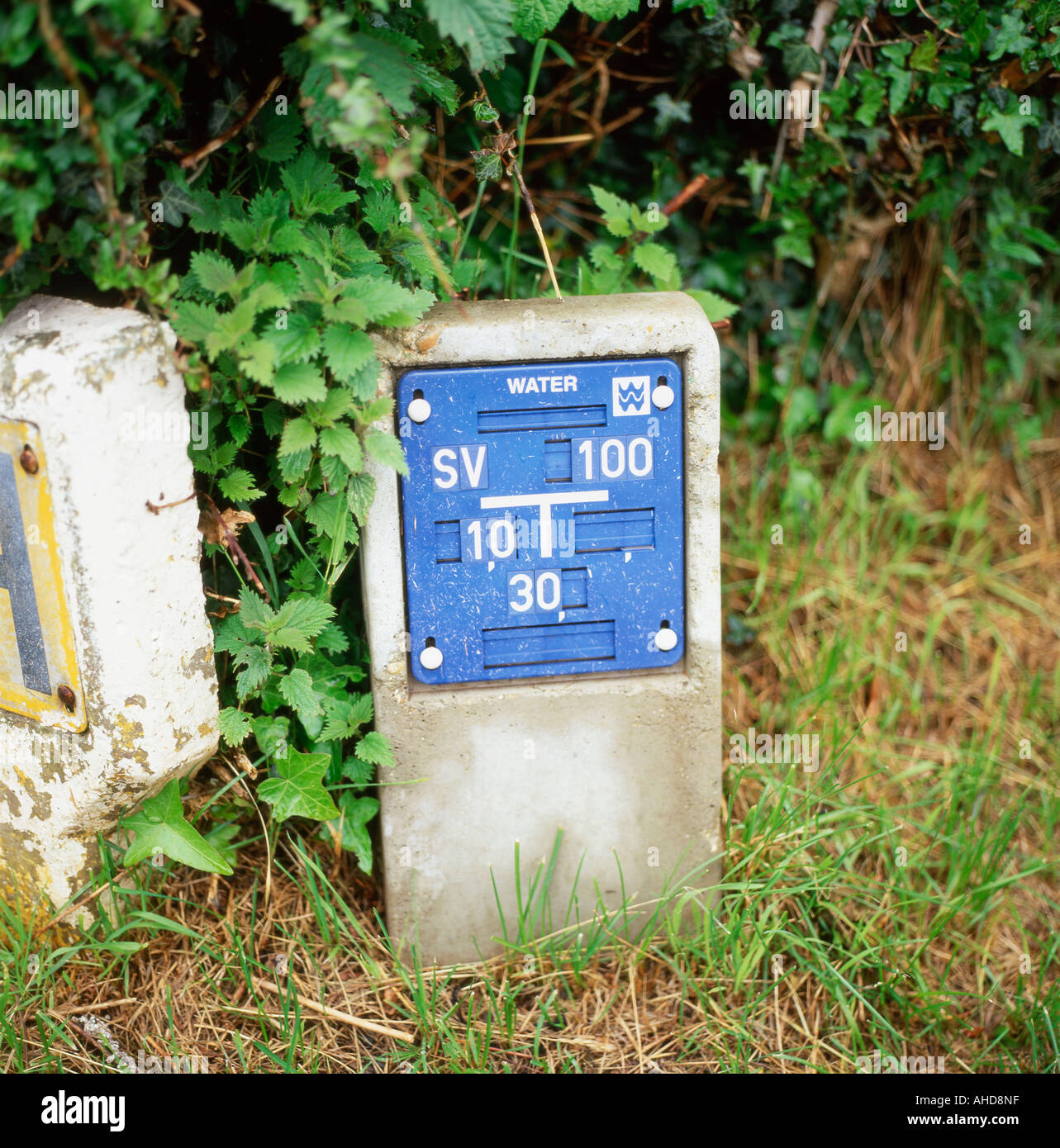 Welsh water marker post Wales UK Stock Photo - Alamy