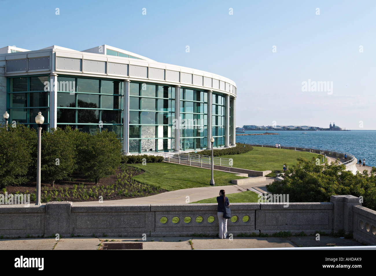 ILLINOIS Chicago Woman view exterior of Shedd Aquarium Oceanarium from ...