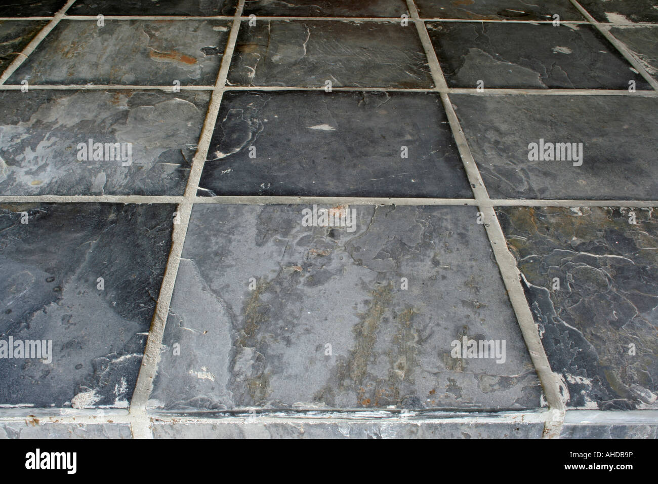 Floor tiles made from slate Stock Photo - Alamy