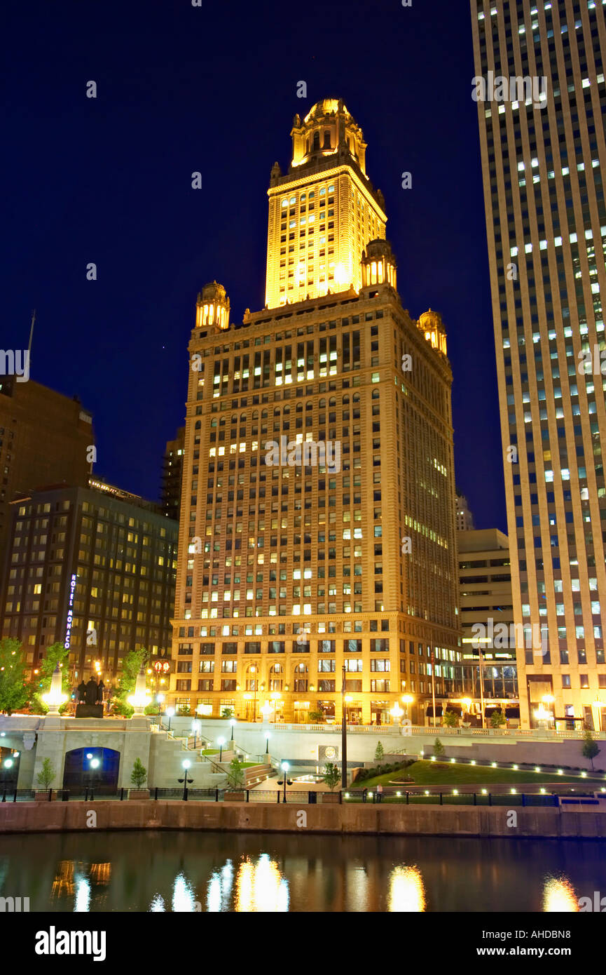 ILLINOIS Chicago Buildings along Chicago River at night lights reflect ...