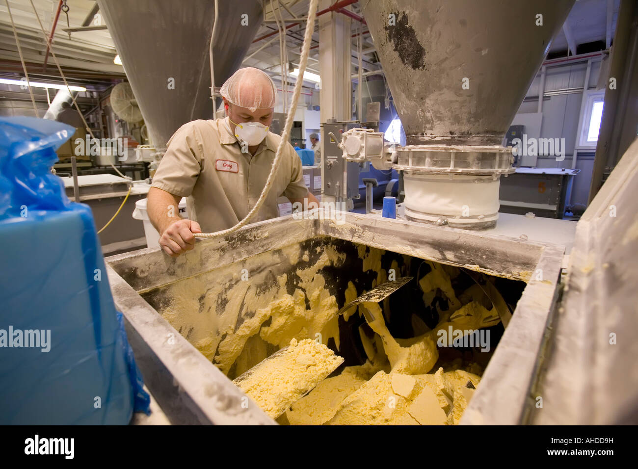 Worker at baking mix factory Stock Photo - Alamy