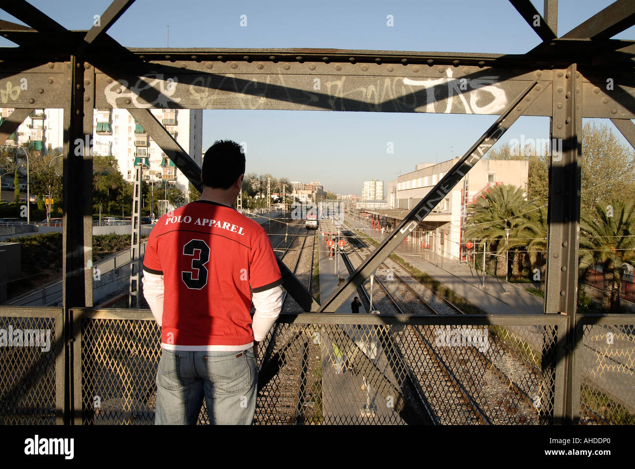 Boy, bridge train railway Stock Photo - Alamy