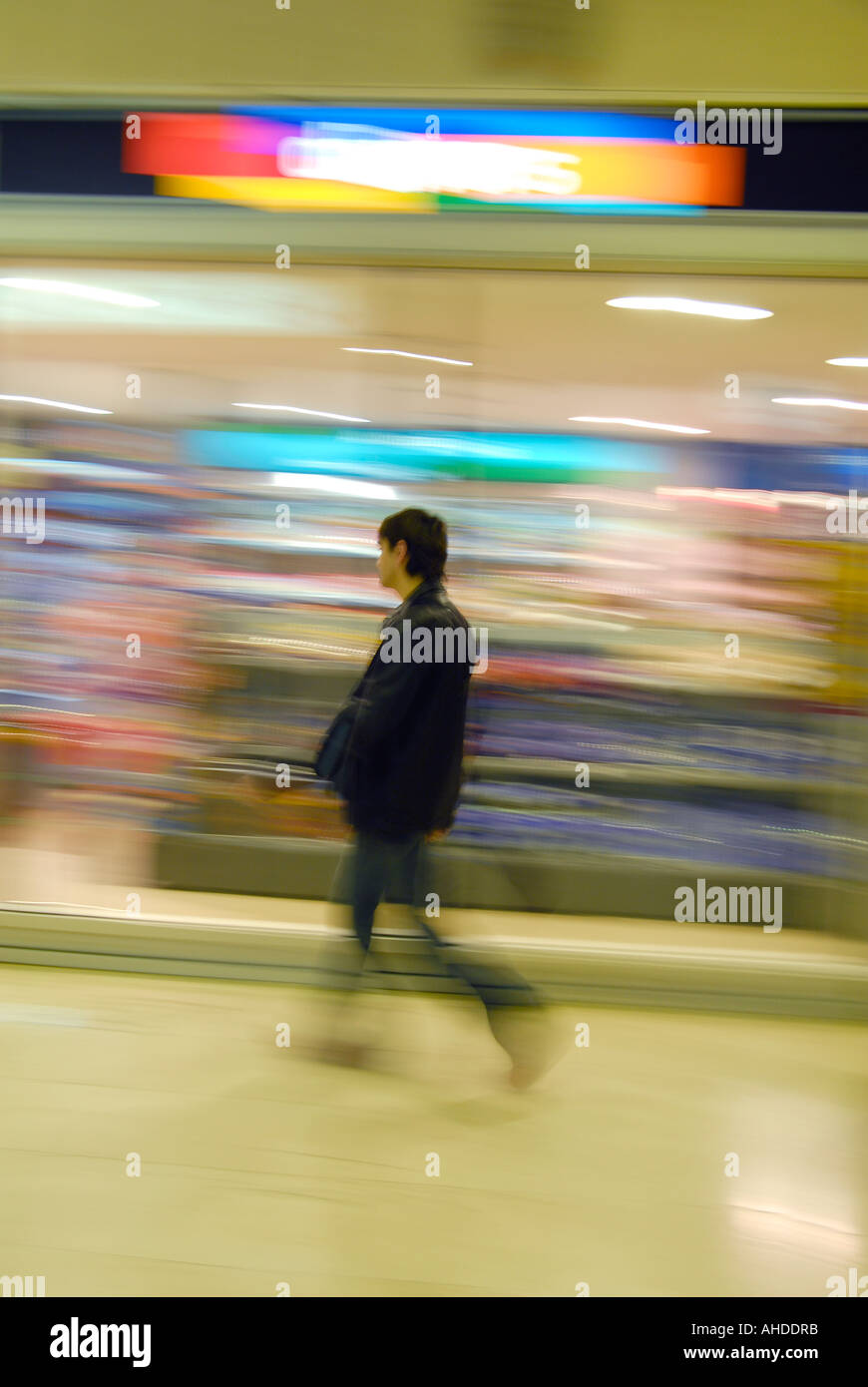 Man walking close to the commercial area Stock Photo - Alamy