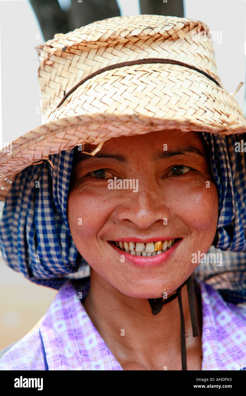 Khmer woman selling tarantula spiders at Skuon, (Spiderville), on NH6 ...