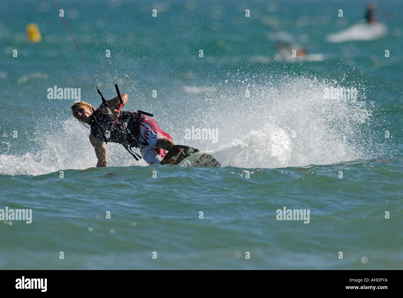 Kite surfer carving Stock Photo - Alamy