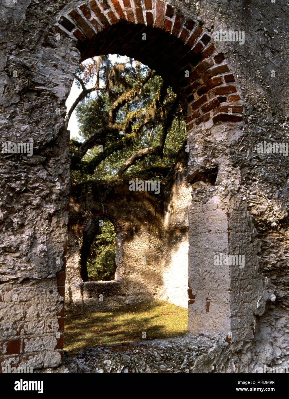This is a photograph of a rock, stone, window, brick archway through ...