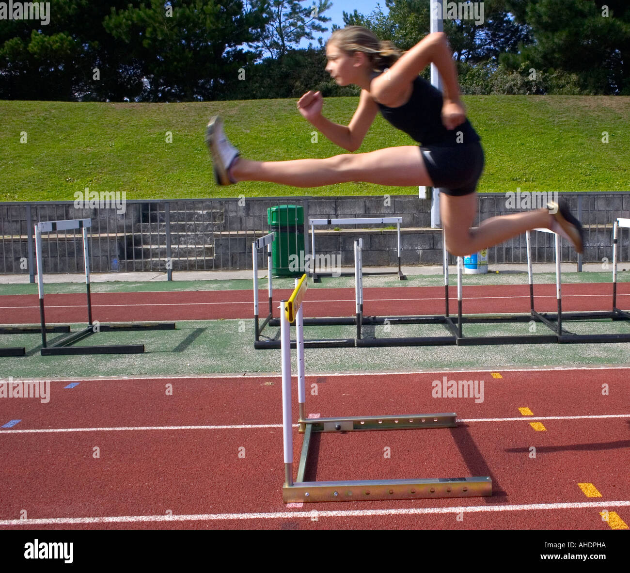 young athlete hurdler Stock Photo - Alamy