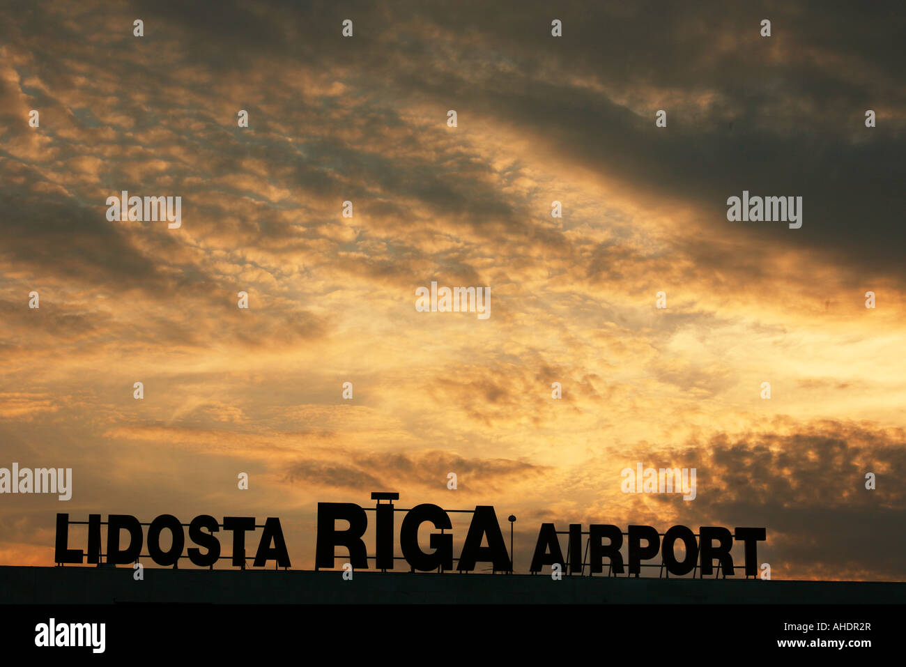 riga airport latvia lidosta sunset ryanair flight Stock Photo - Alamy