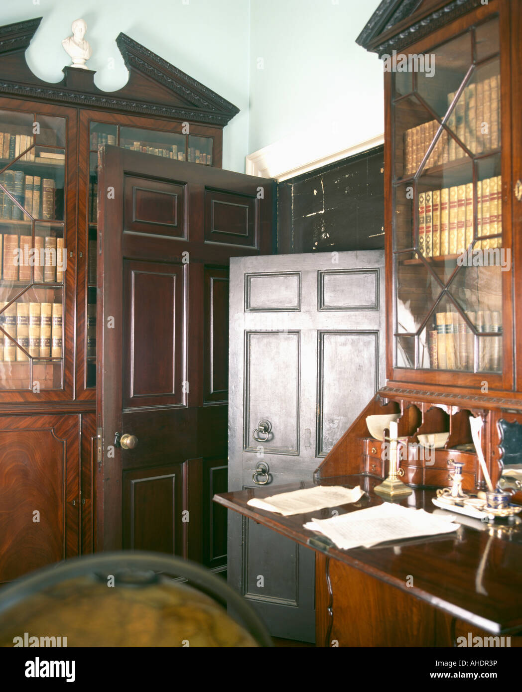 Bookshelves and bureau bookcase in Georgian library Stock Photo - Alamy