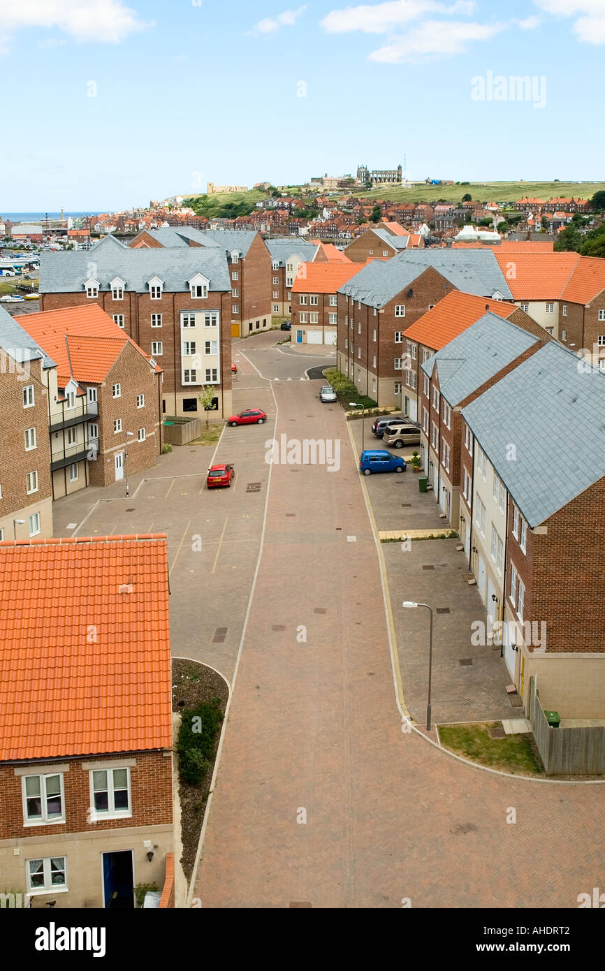 Apartment blocks and houses on a development built on the bank of the ...