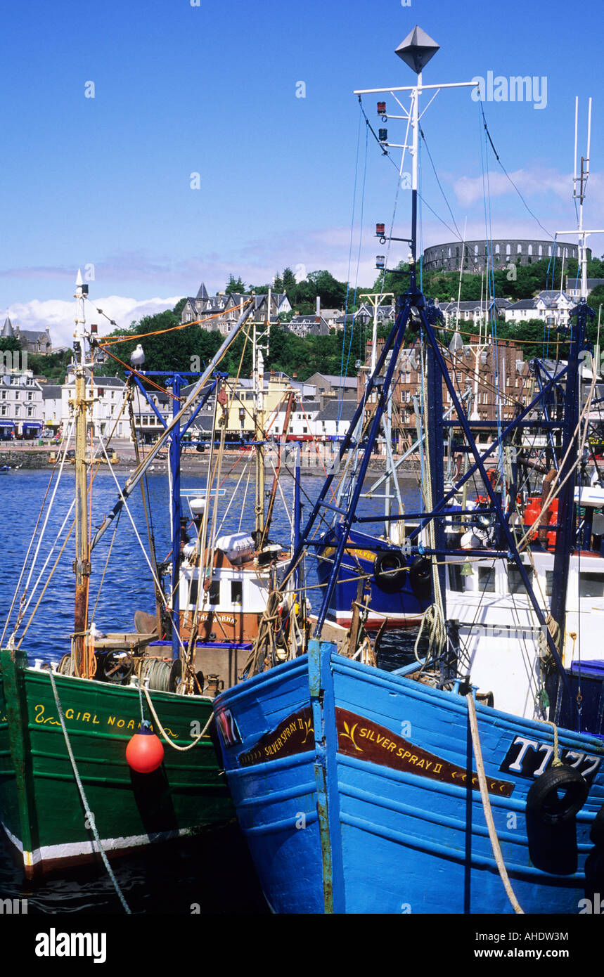 Oban Harbour fishing boats McCaig's Folly Scotland UK Stock Photo - Alamy