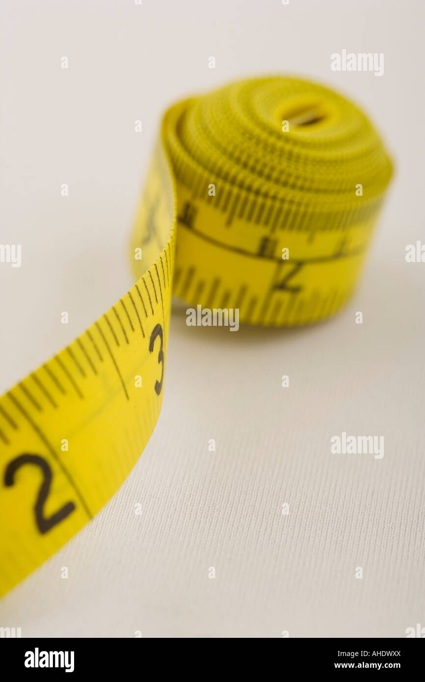 Yellow tape measure Stock Photo - Alamy